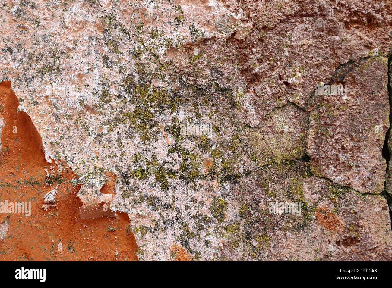 Close up detailed surface of weathered paint on different walls in high ...