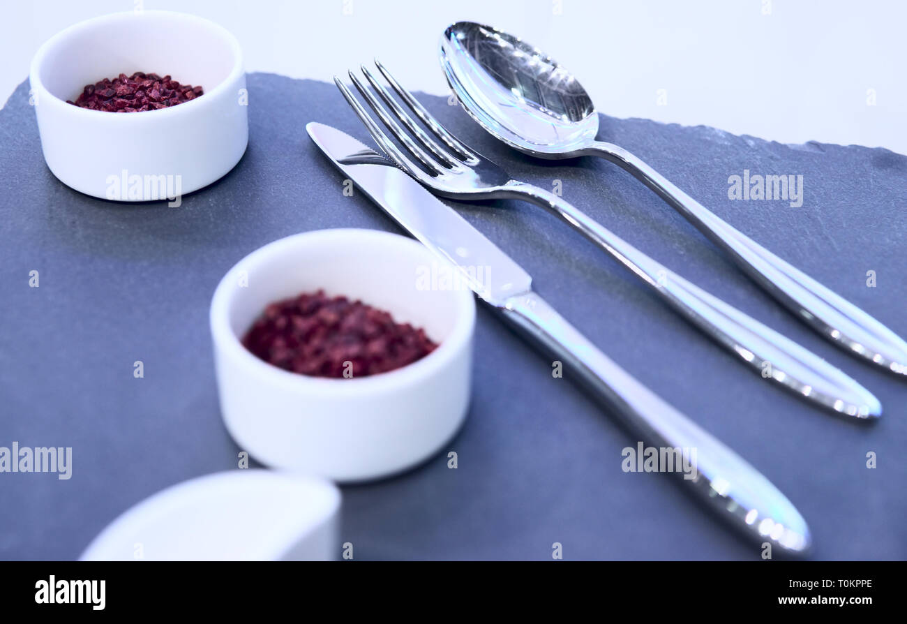 Simple silverware set, blue toned image Stock Photo - Alamy