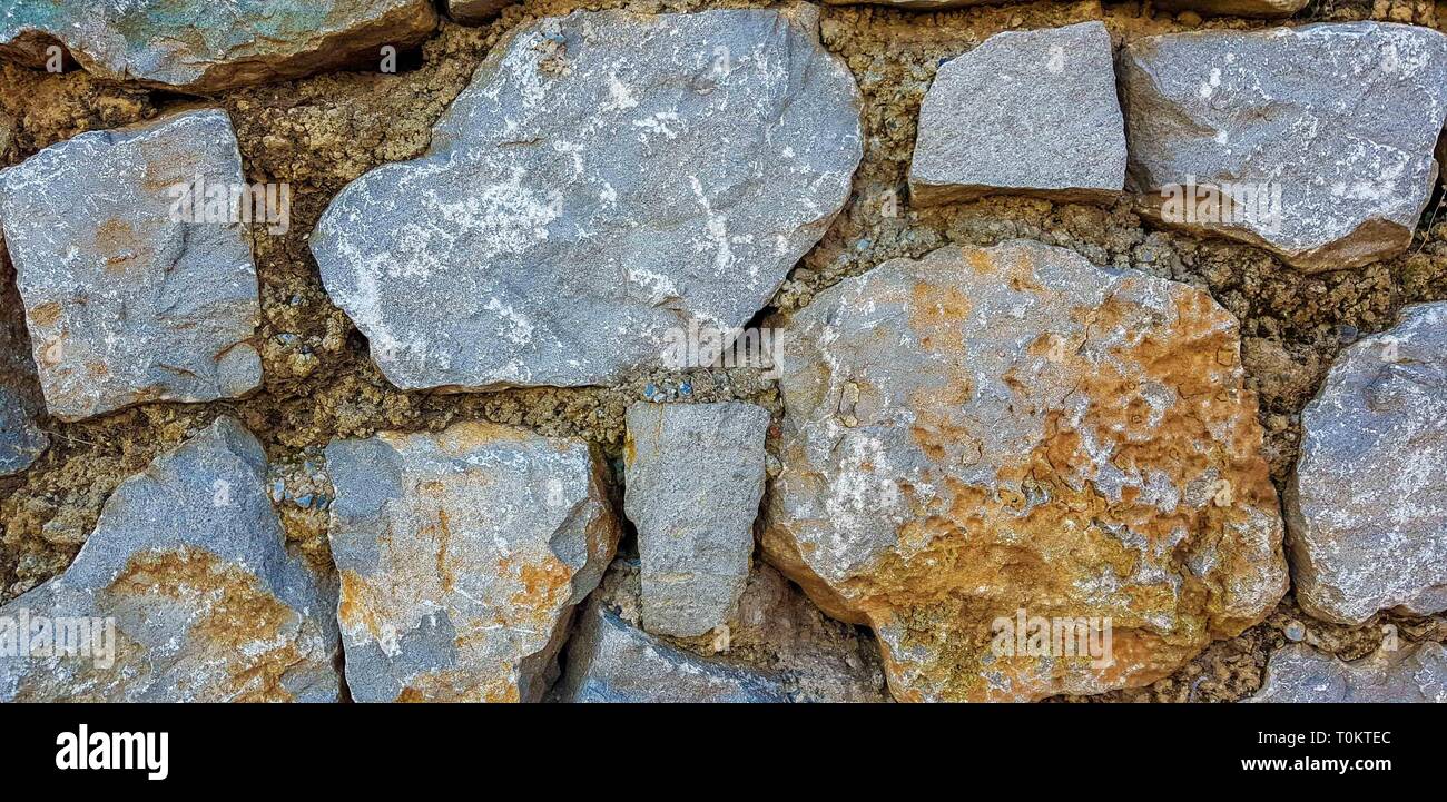 Stone wall rustic texture background. Textured stone wall closeup Stock ...