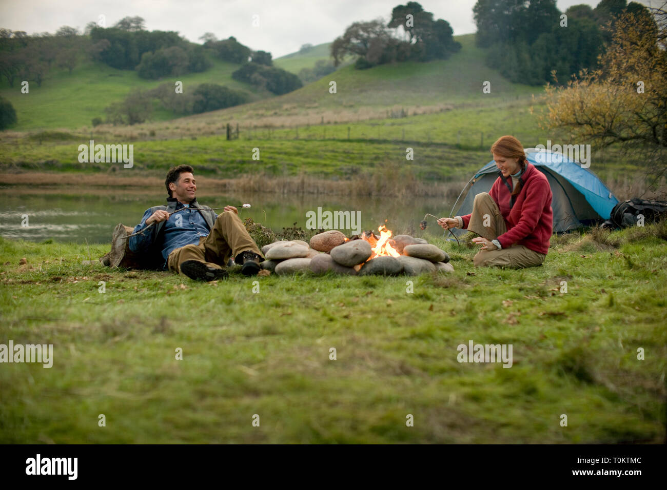 Sitting beside a fire hi-res stock photography and images - Alamy