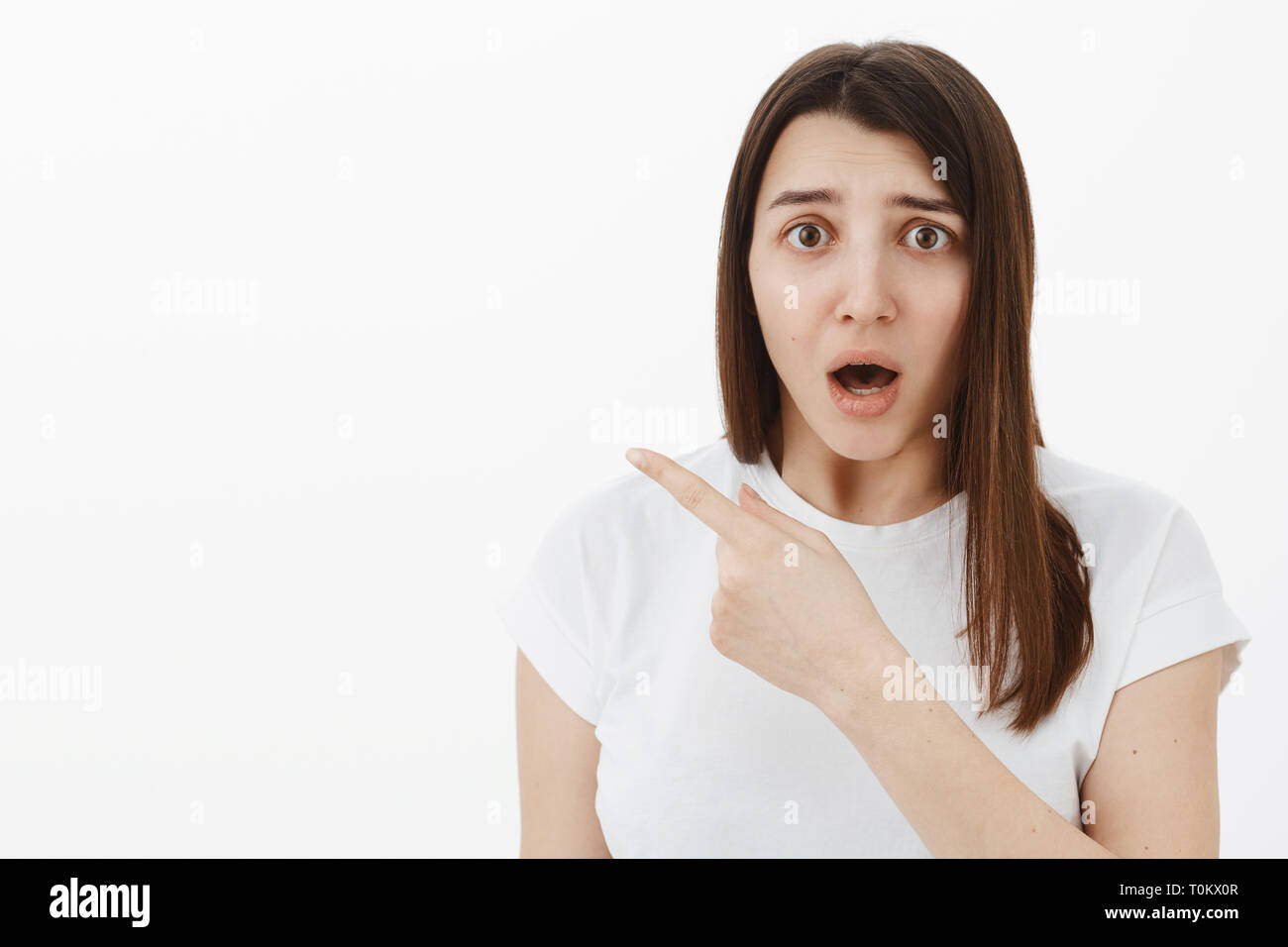 Concerned and shocked nervous woman looking questioned and worried at ...