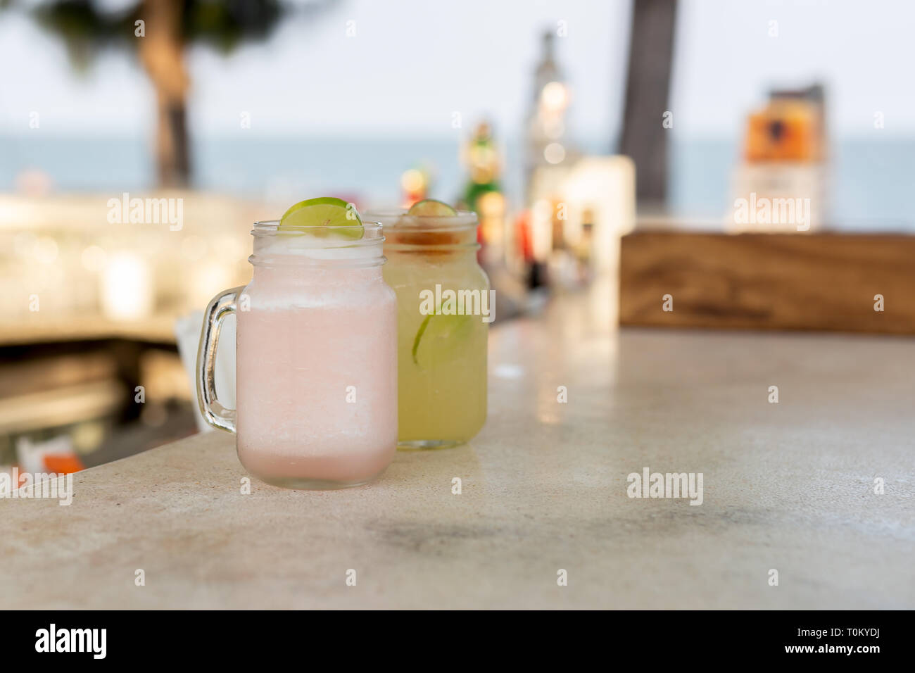 Healthy fresh lychee and lemon drink with slice of lime Stock Photo - Alamy