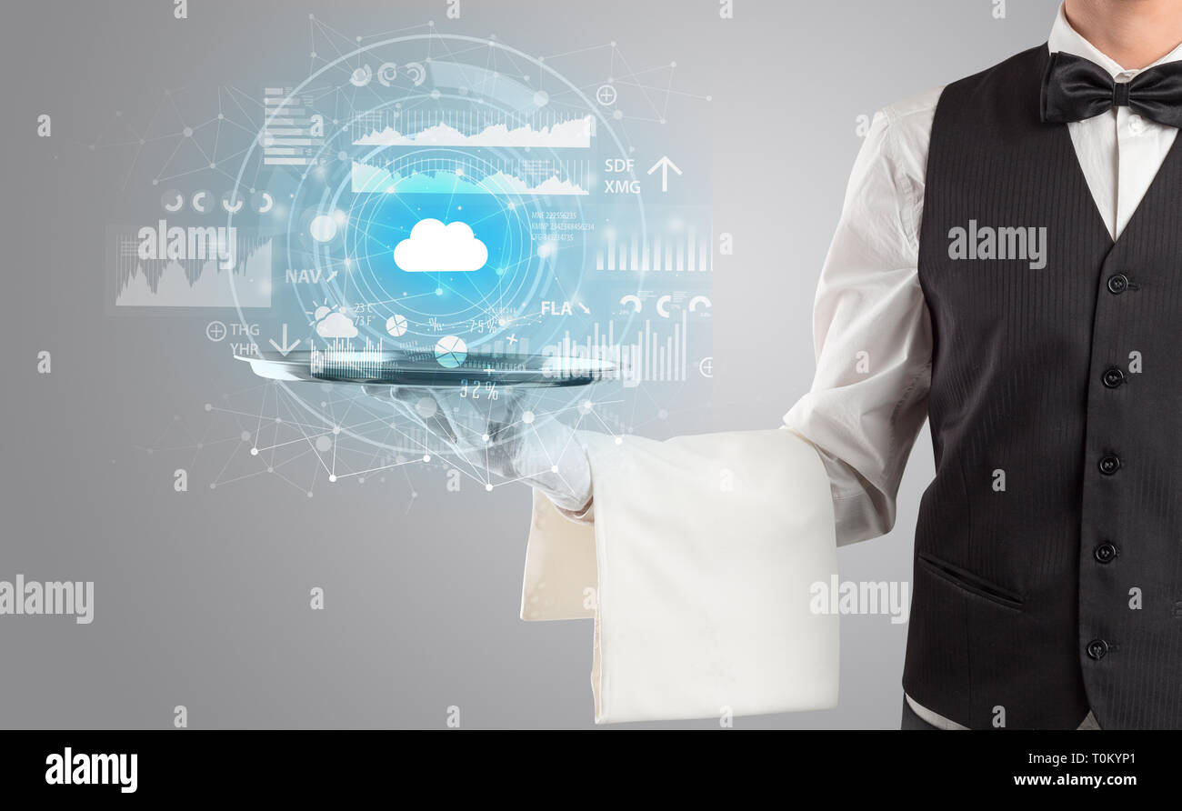 Elegant young waiter serving cloud technology concept Stock Photo - Alamy