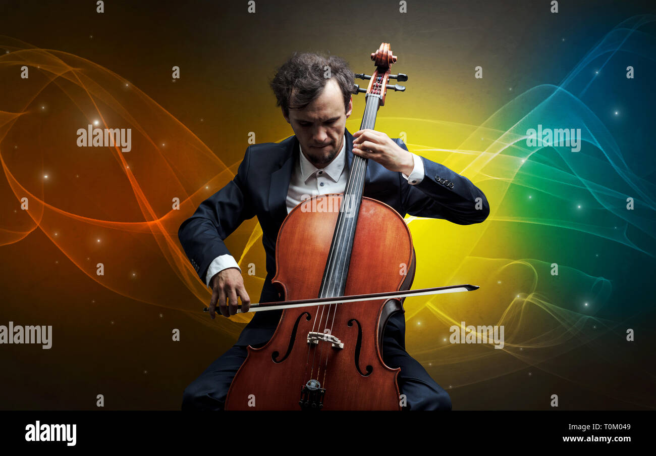 Serious classical cellist with fabled sparkling wallpaper Stock Photo ...