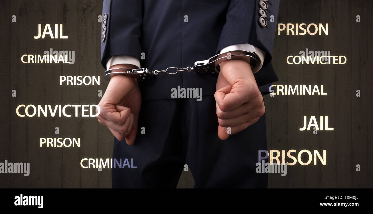 Jail convicted prison criminal labels with close handcuffed man Stock ...