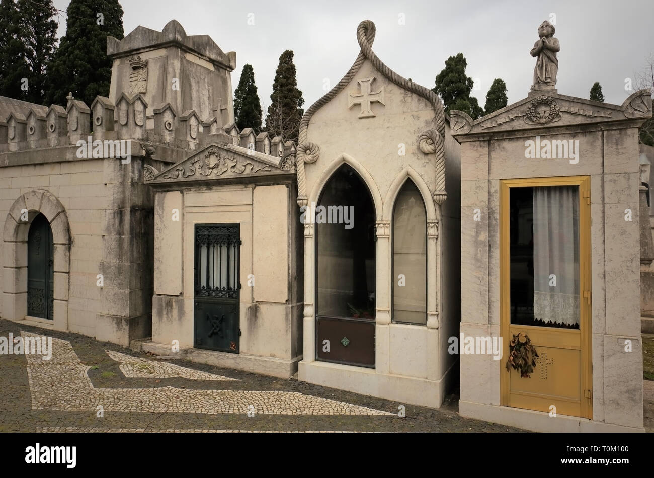 Old European cemetery architecture with streets, chapels and statues ...
