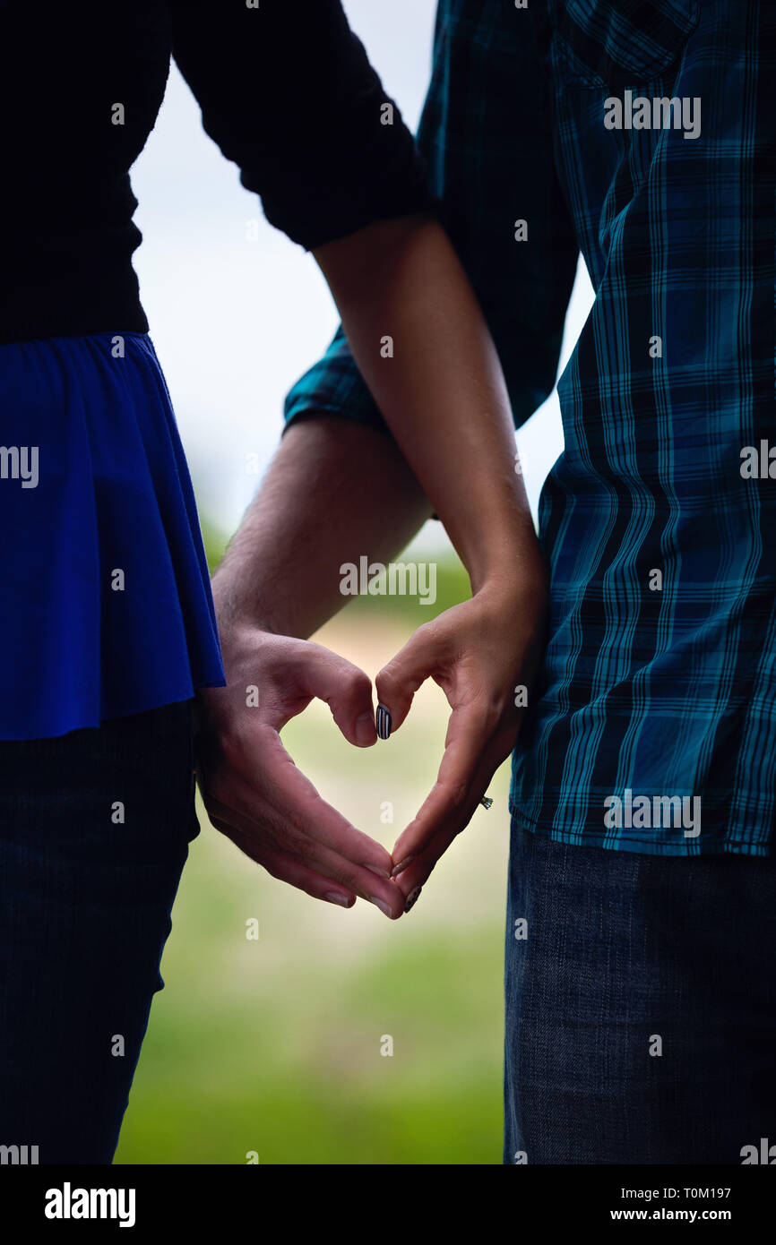 Couple heart hands close up hi-res stock photography and images - Alamy
