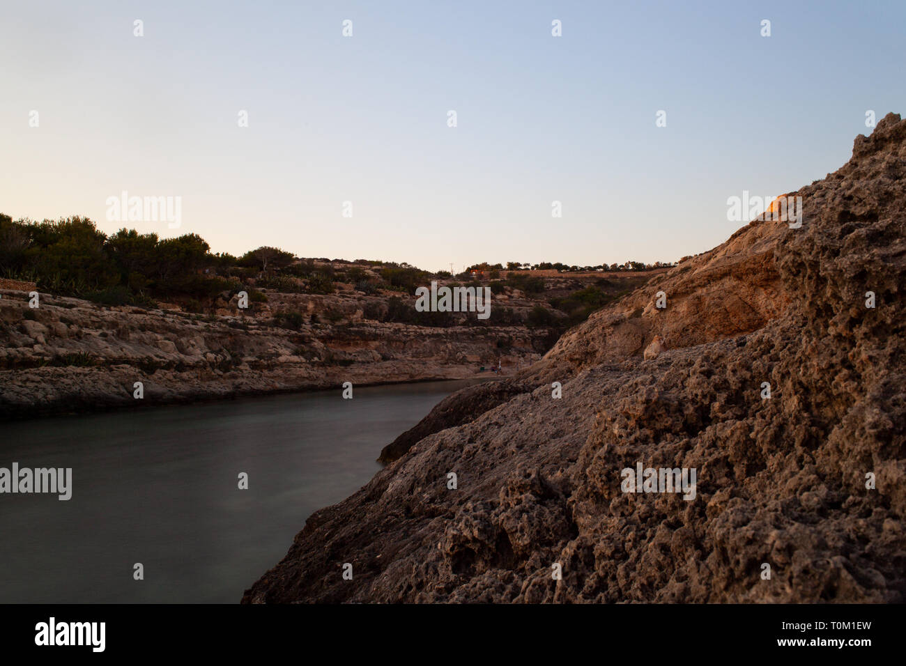 View of rock coast called Cala Greca, Lampedusa Stock Photo - Alamy
