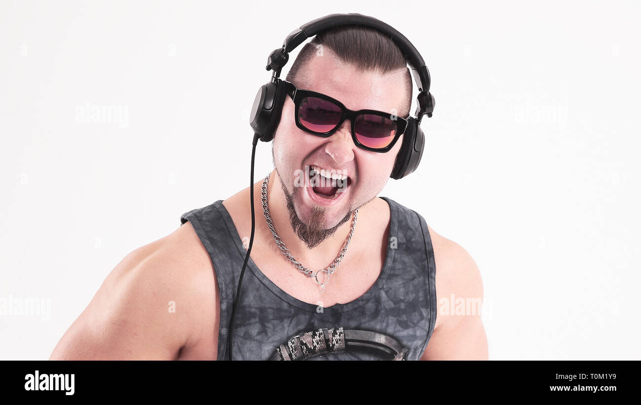 DJ-rapper in the headphones.isolated on white background Stock Photo ...