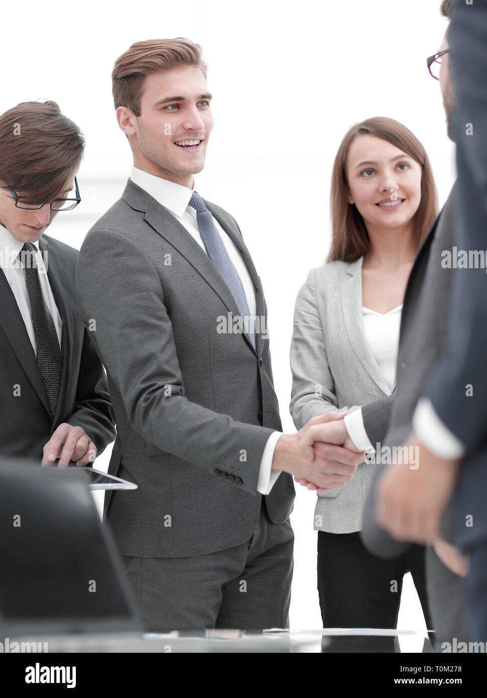 Business partners handshaking close hi-res stock photography and images ...
