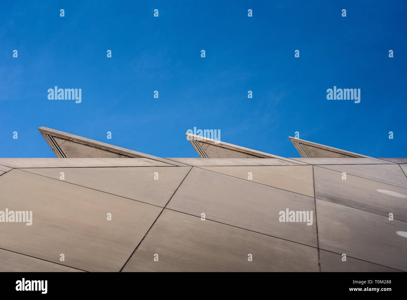 futuristic construction detail with acute-angle roof and balcony ...