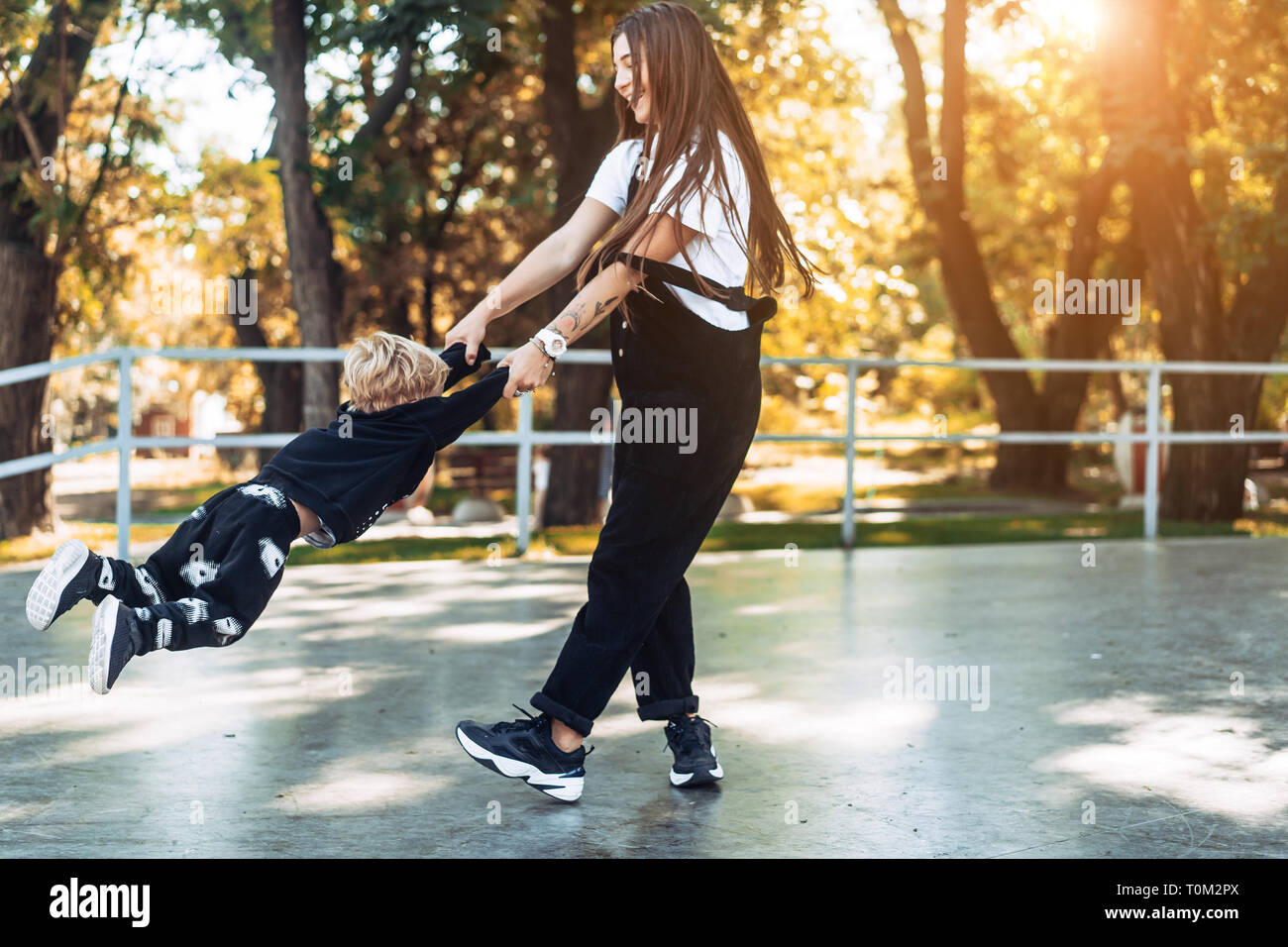 Boy spinning around hi-res stock photography and images - Alamy