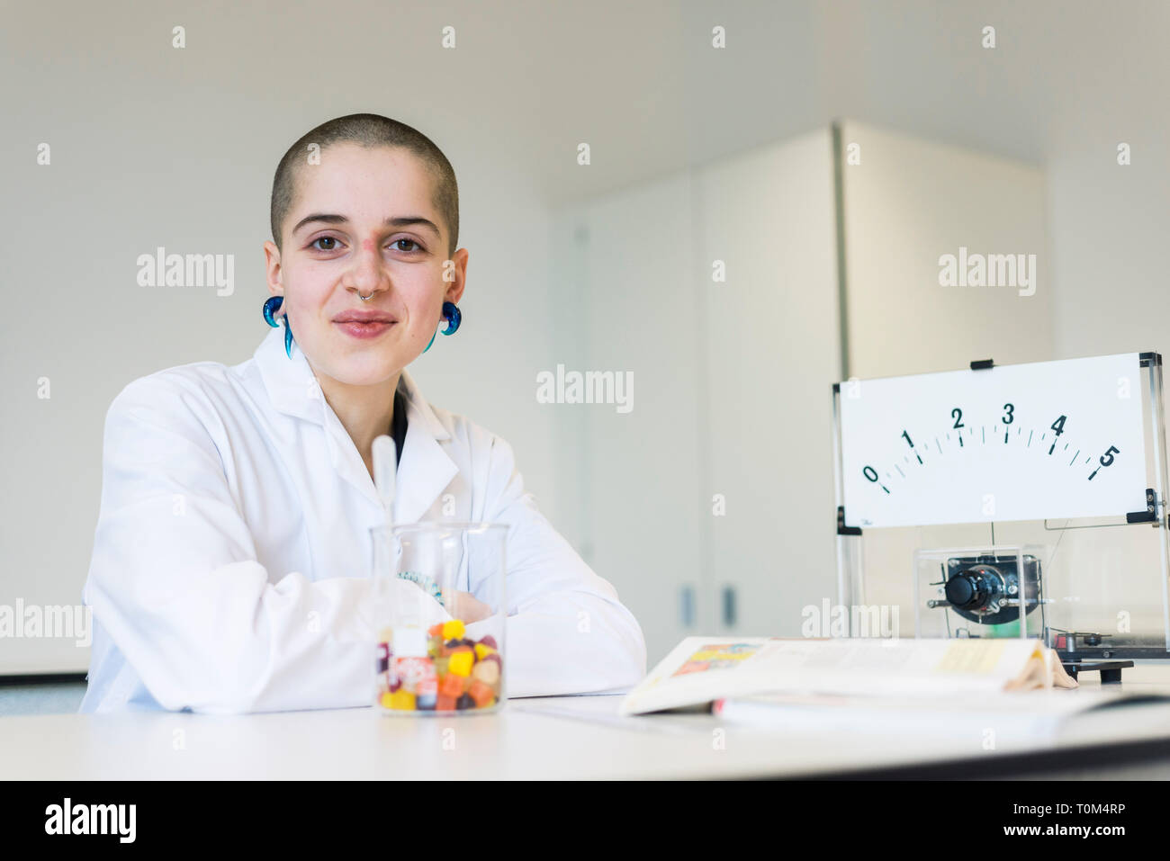 An alternative student in the science lab / classroom of a university ...