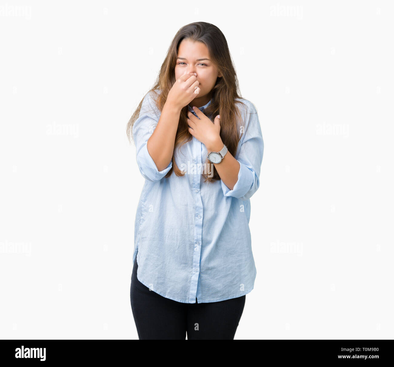 Young beautiful brunette business woman over isolated background ...
