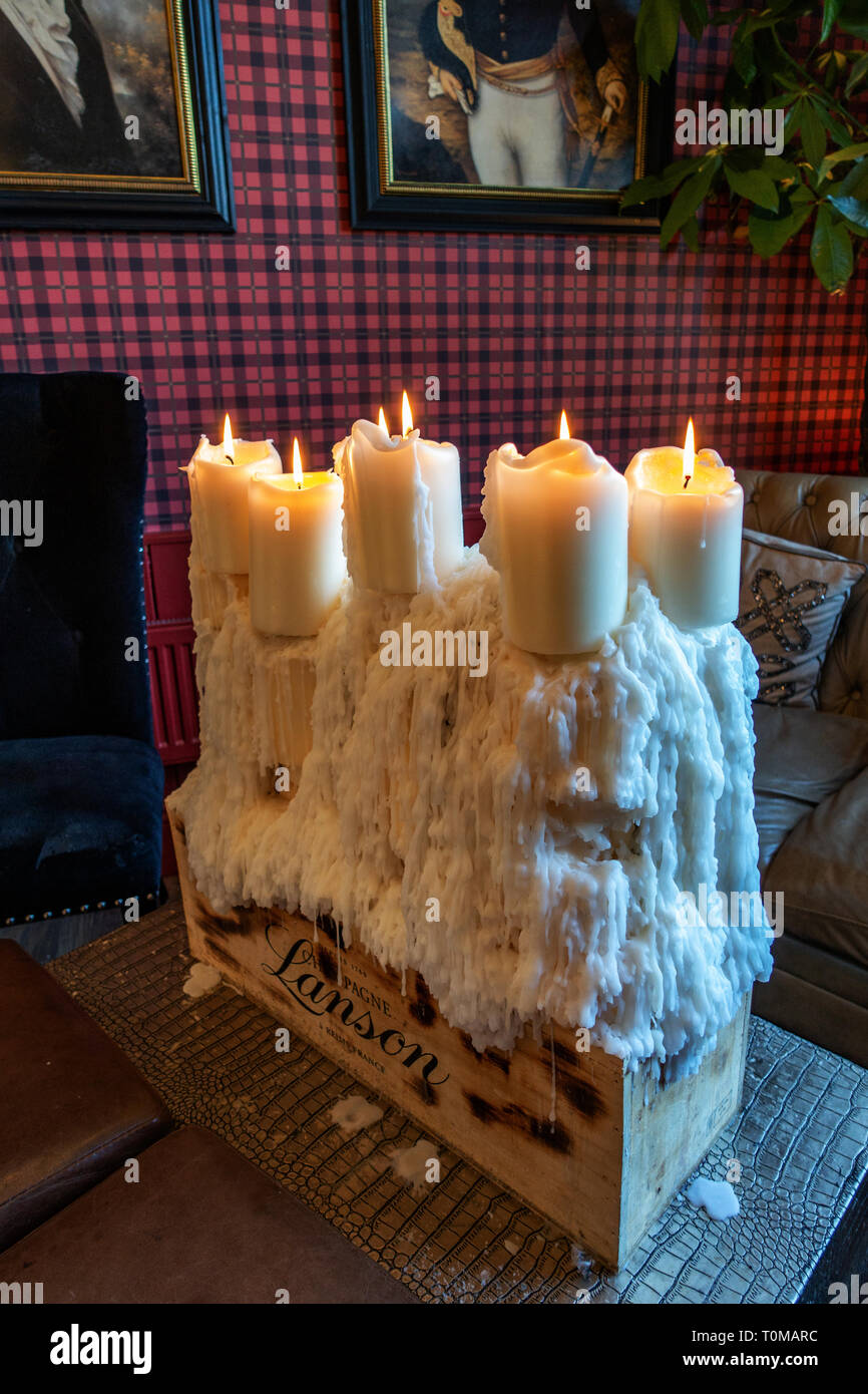 wonderful cluster of beautiful old church style candles perched on the ...