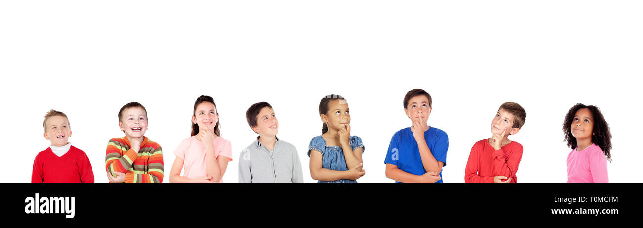 Pensive children thinking about something isolated on a white ...