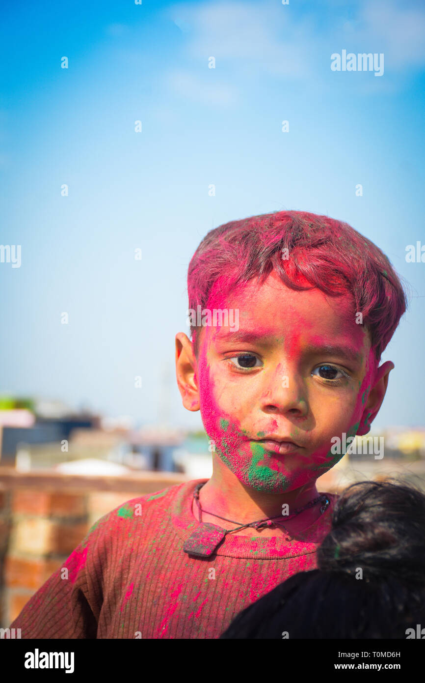 little boy playing holi festival Stock Photo - Alamy