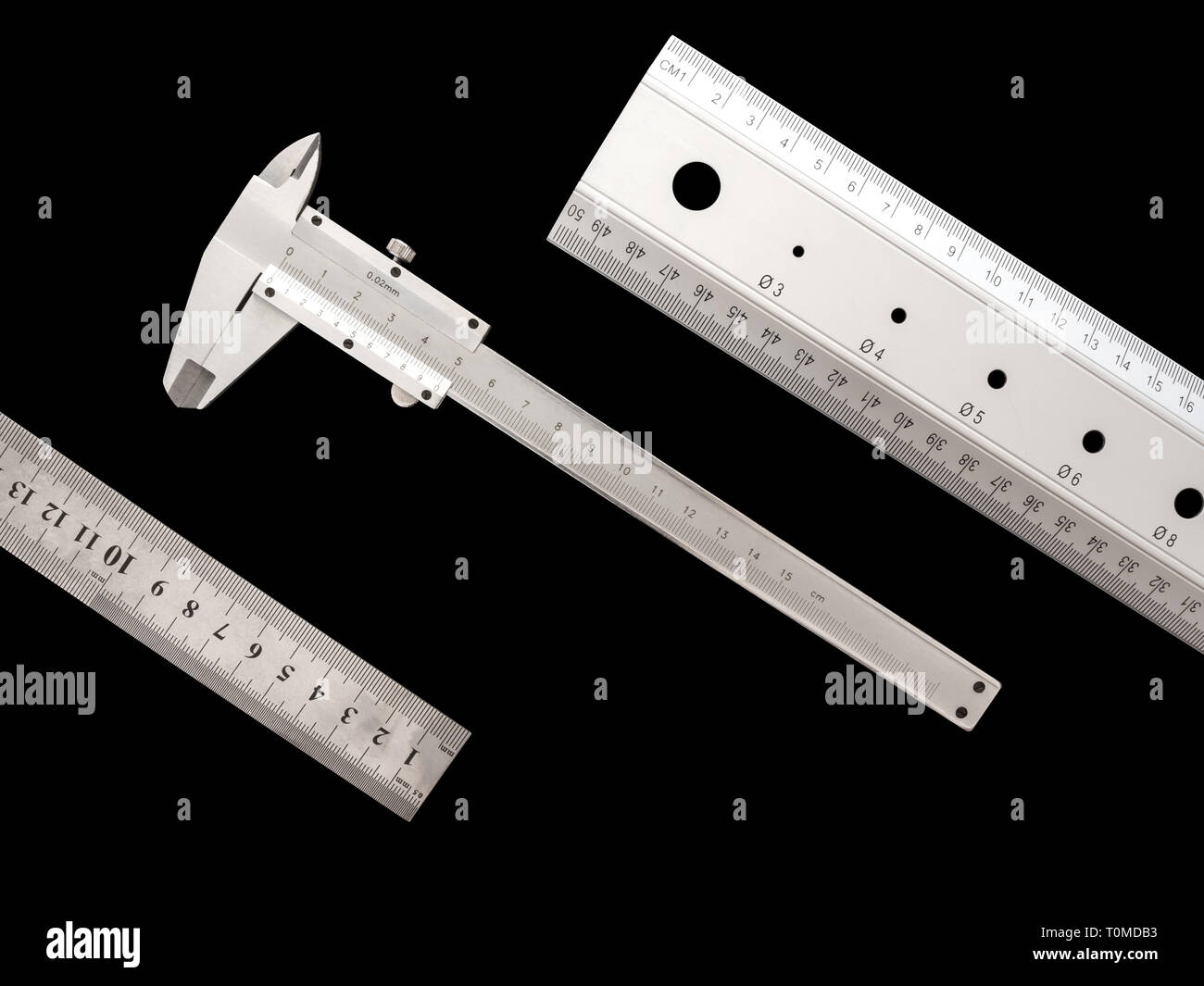 Two rulers and caliper. Technical and surveying concepts Stock Photo ...