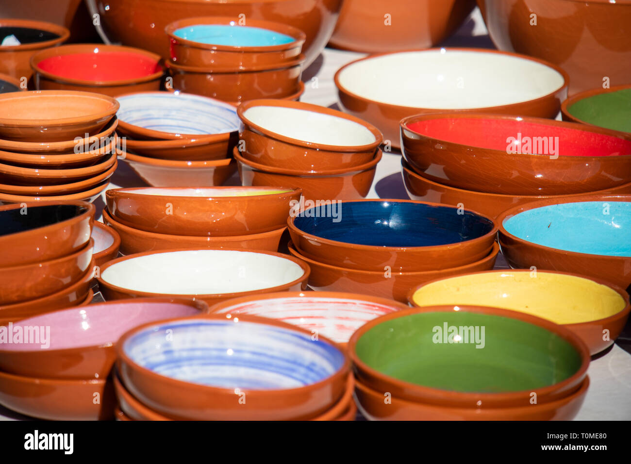 variety of colorful ceramic bowls, pottery Stock Photo - Alamy