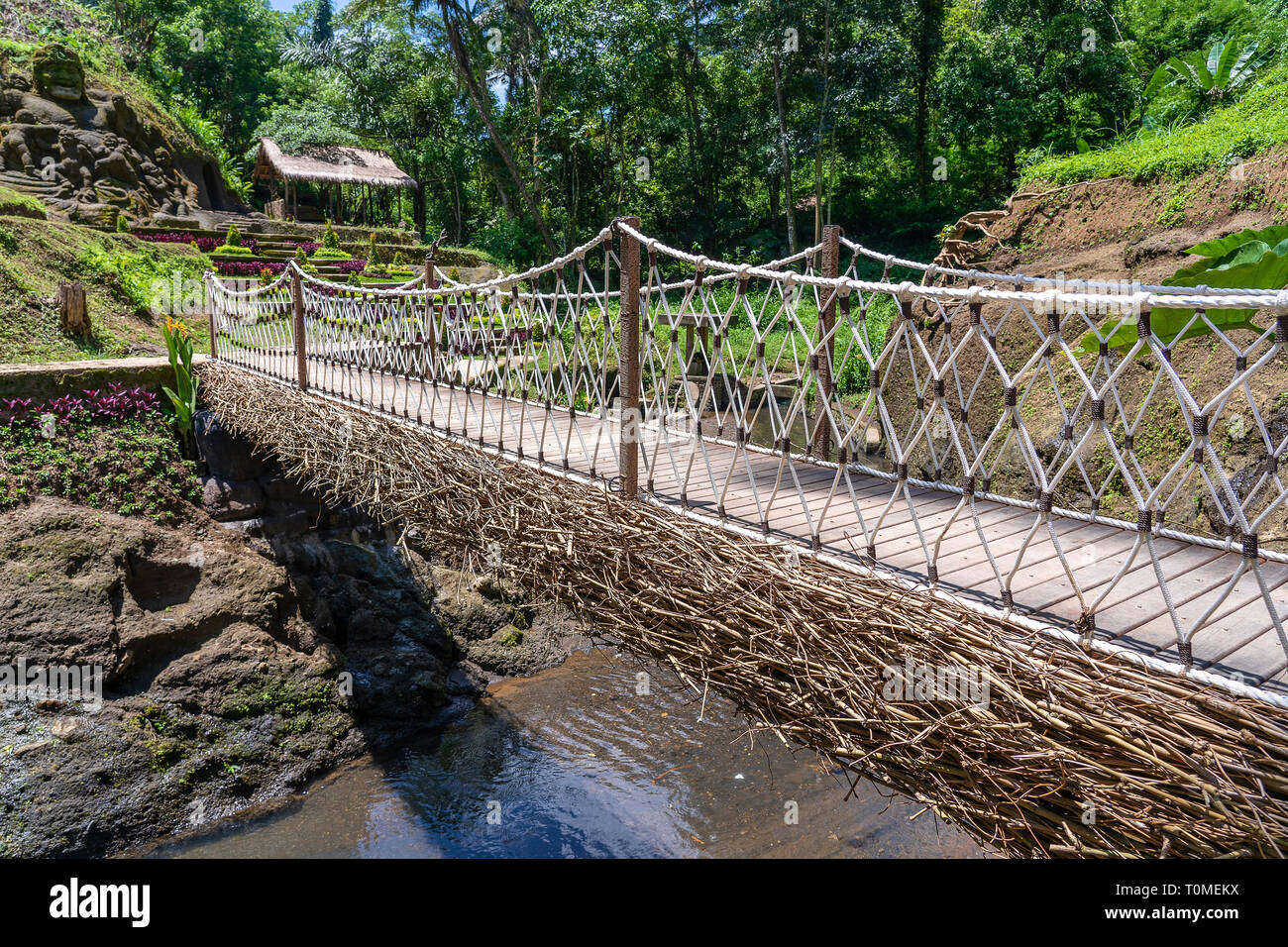 Suspension bridge in the jungle near the rice terraces in island Bali ...