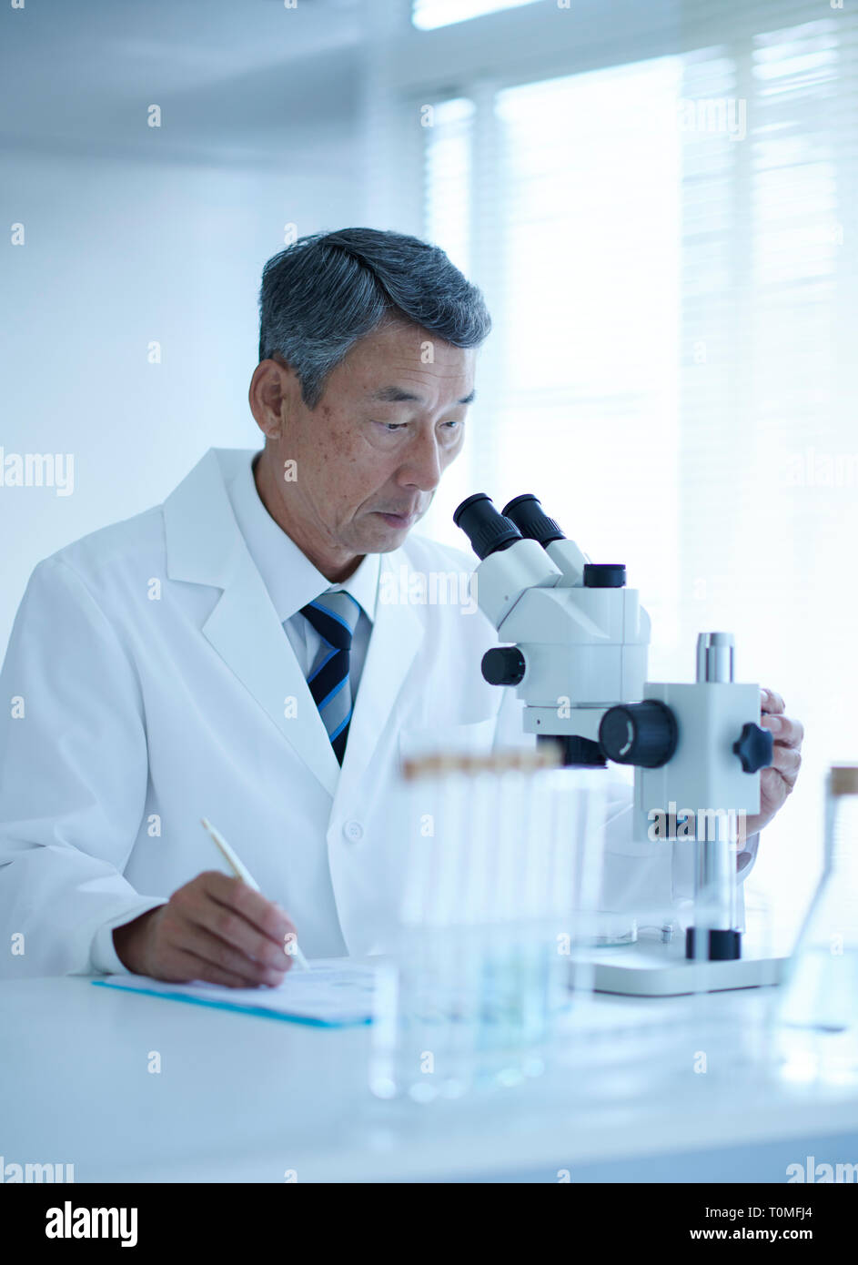 Senior Japanese researcher in the lab Stock Photo - Alamy