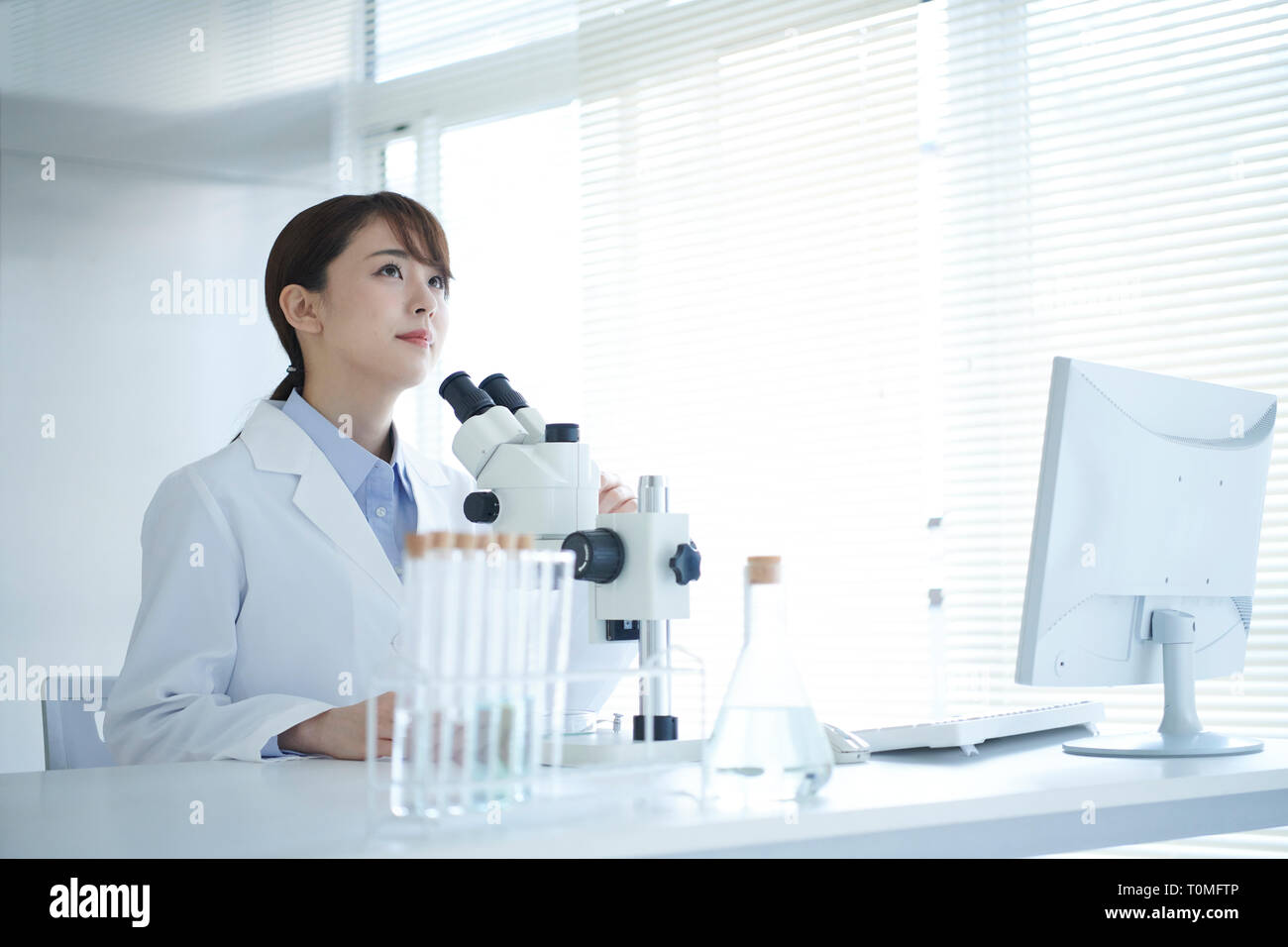 Young Japanese researcher in the lab Stock Photo - Alamy
