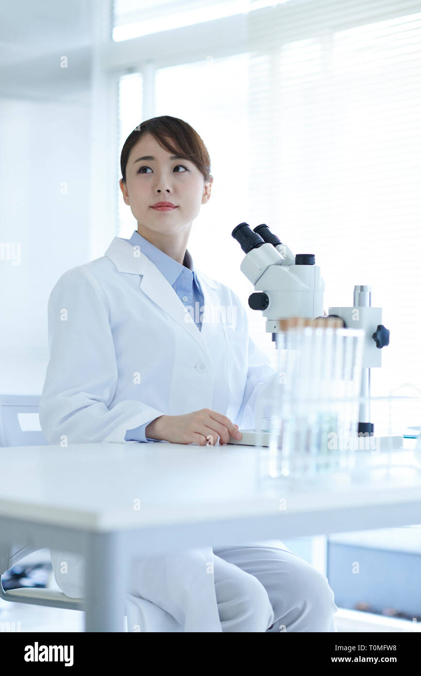 Young Japanese researcher in the lab Stock Photo - Alamy