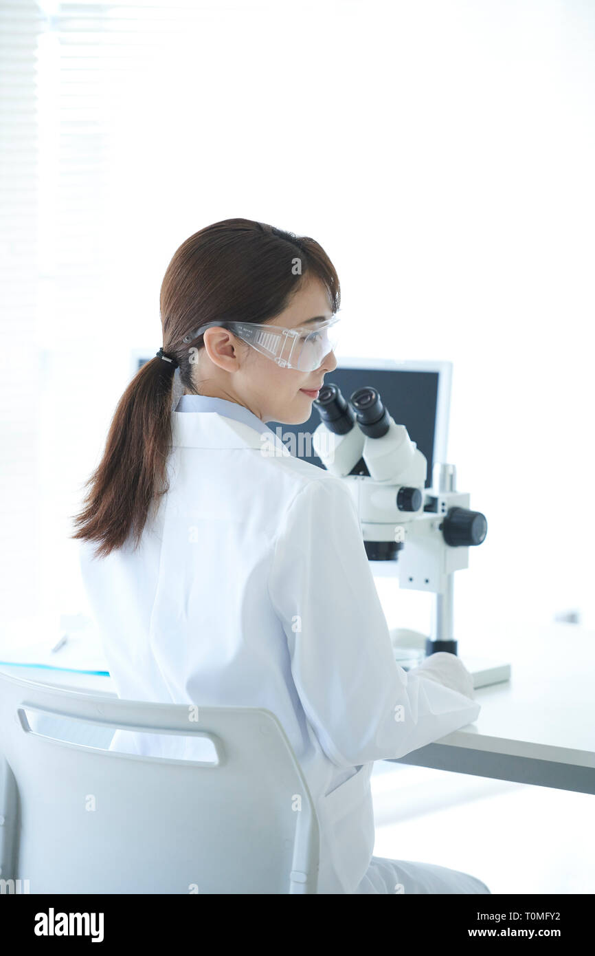 Young Japanese researcher in the lab Stock Photo - Alamy