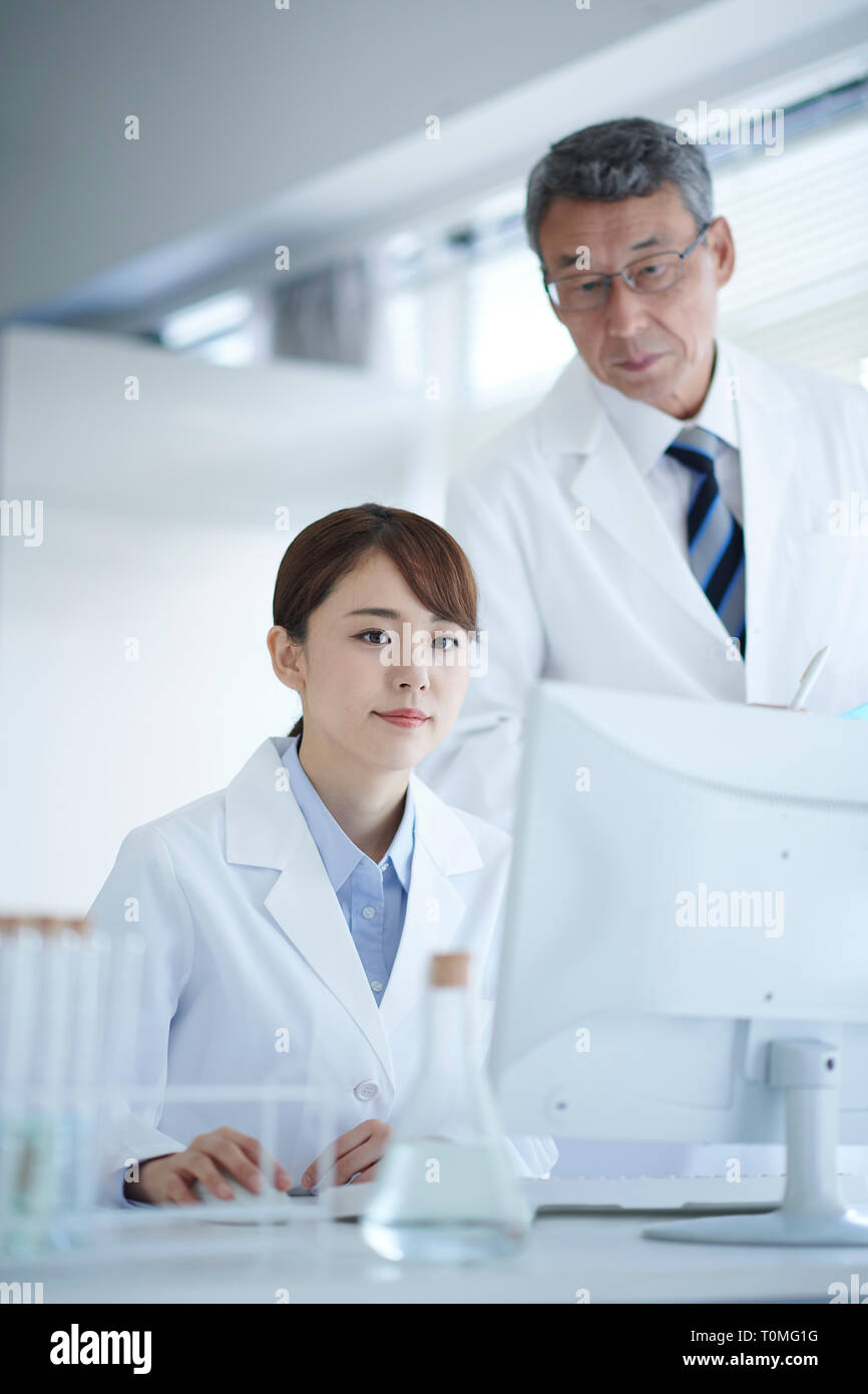 Japanese researchers in the lab Stock Photo - Alamy