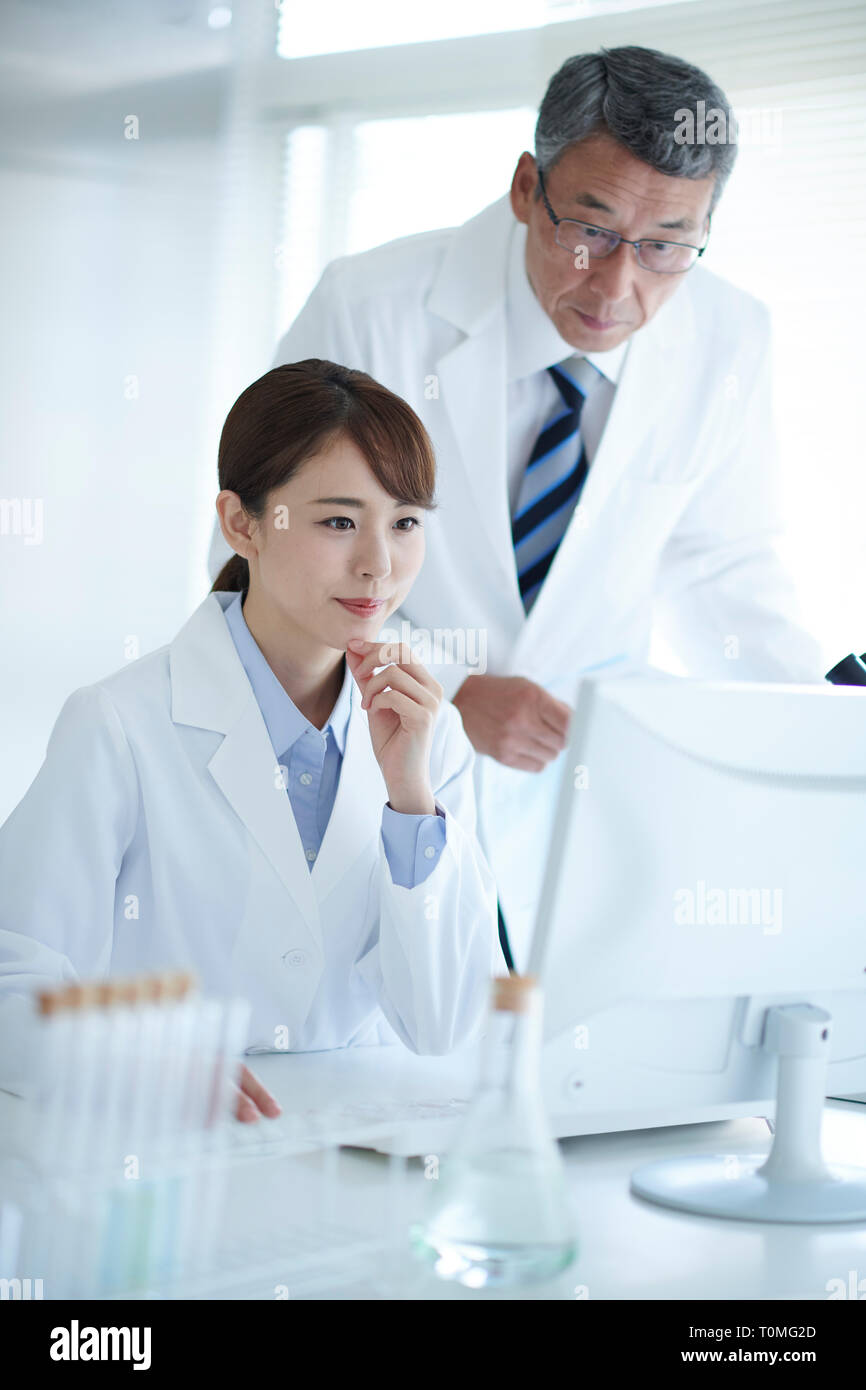 Japanese researchers in the lab Stock Photo - Alamy