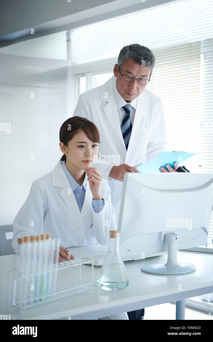 Japanese researchers in the lab Stock Photo - Alamy