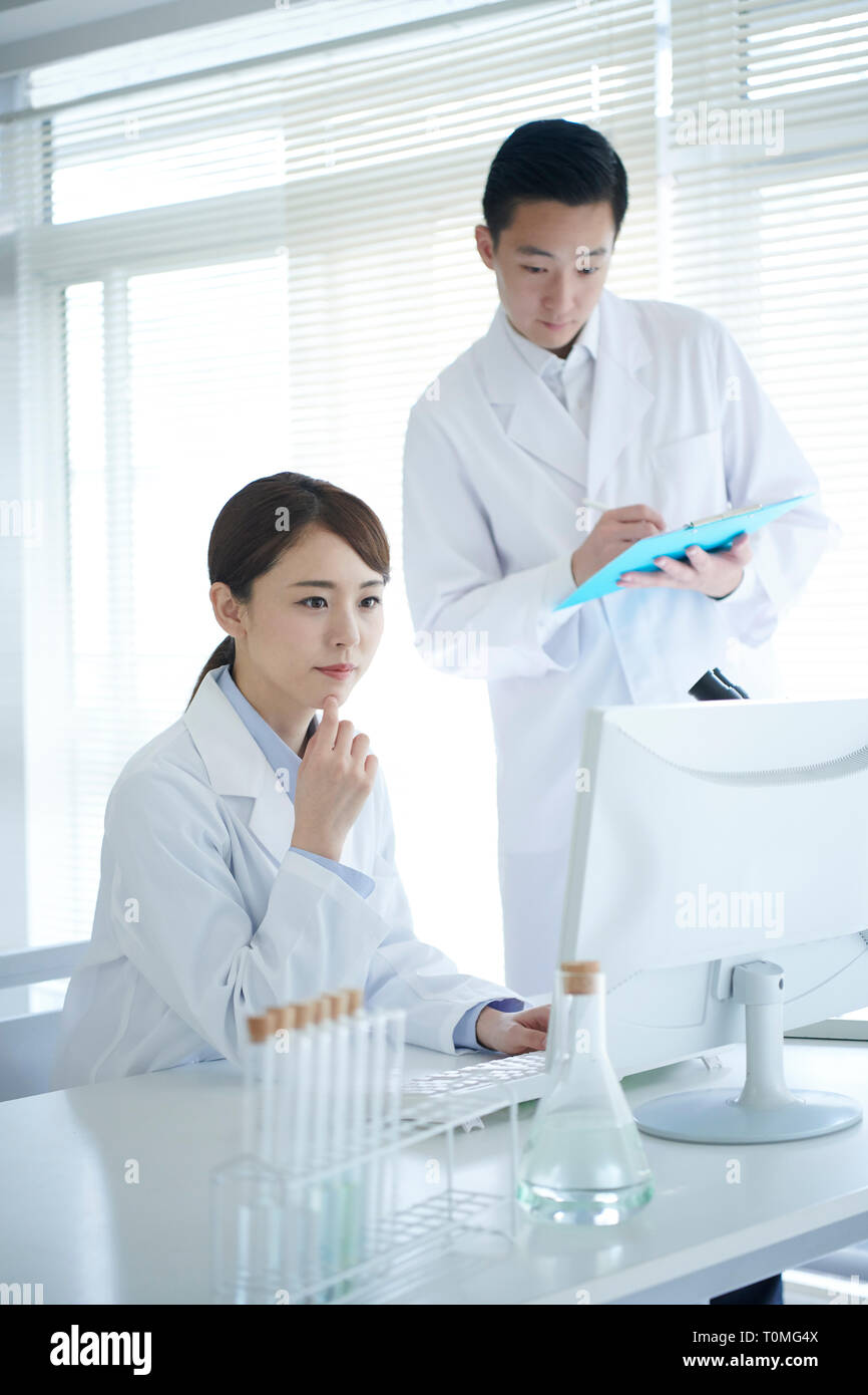 Japanese researchers in the lab Stock Photo - Alamy