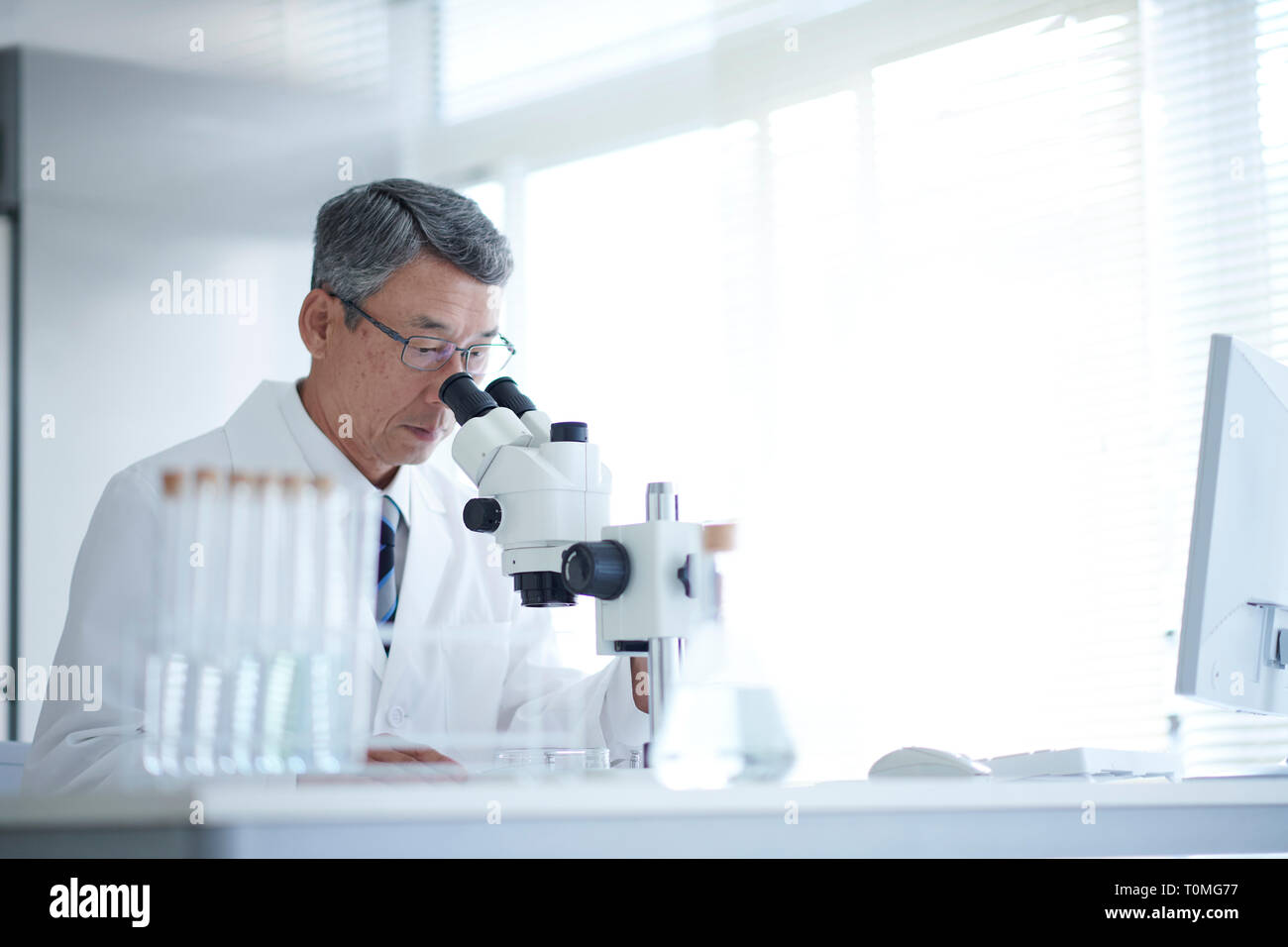 Senior Japanese researcher in the lab Stock Photo - Alamy