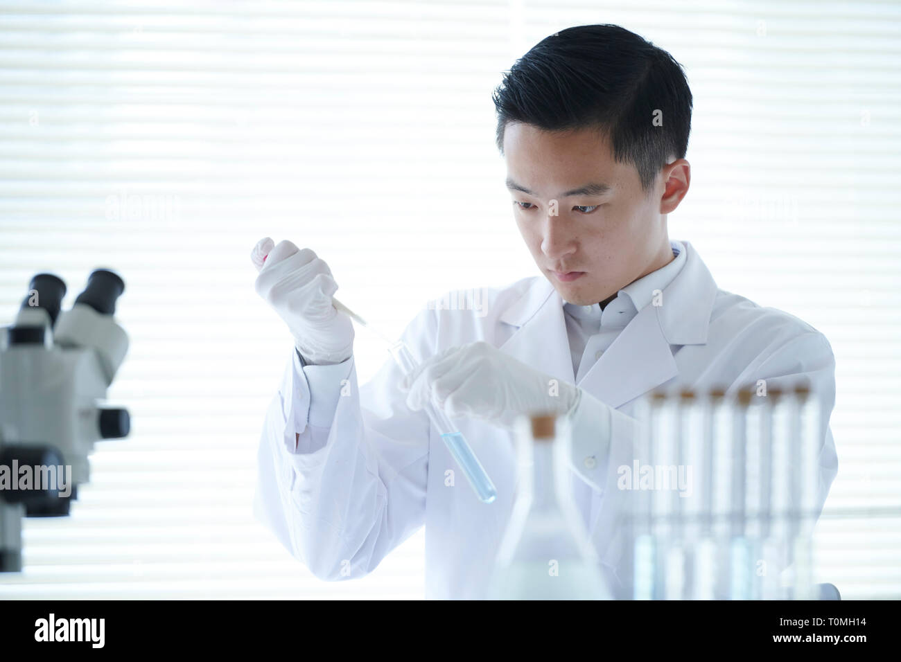 Young Japanese researcher in the lab Stock Photo - Alamy