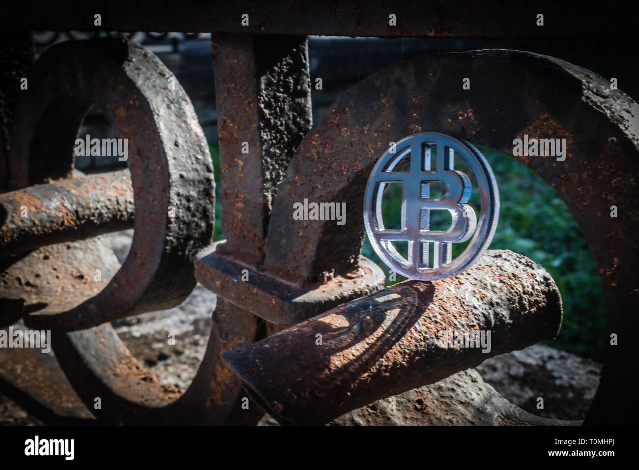 Cleat plastic bit coin on the steal rustic rusty fence rail Stock Photo ...