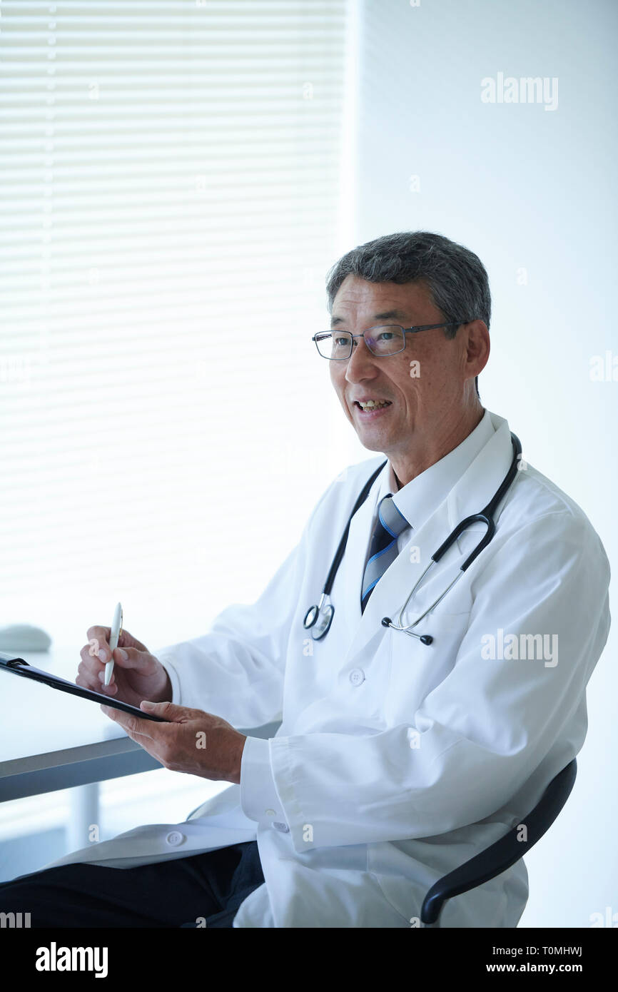 Japanese doctor at work Stock Photo - Alamy