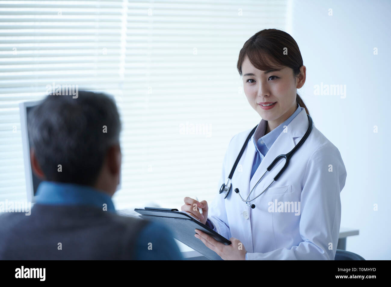 Japanese doctor at work Stock Photo - Alamy