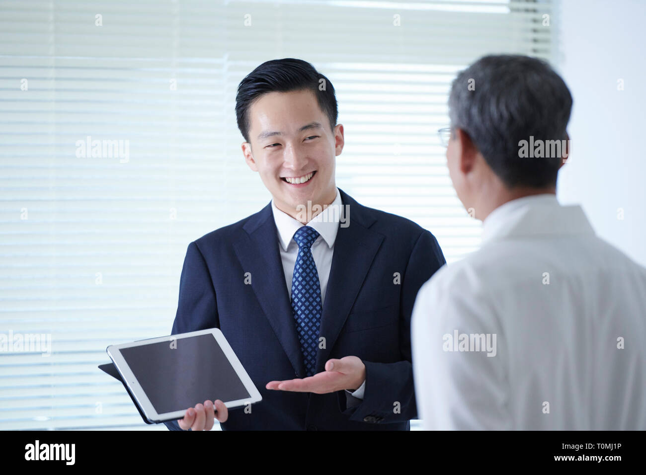 Japanese doctor at work Stock Photo - Alamy