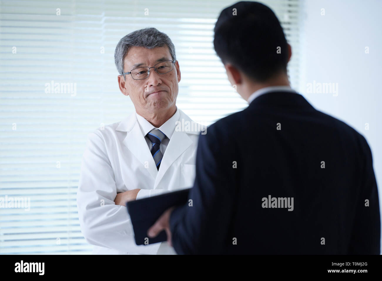 Japanese doctor at work Stock Photo - Alamy