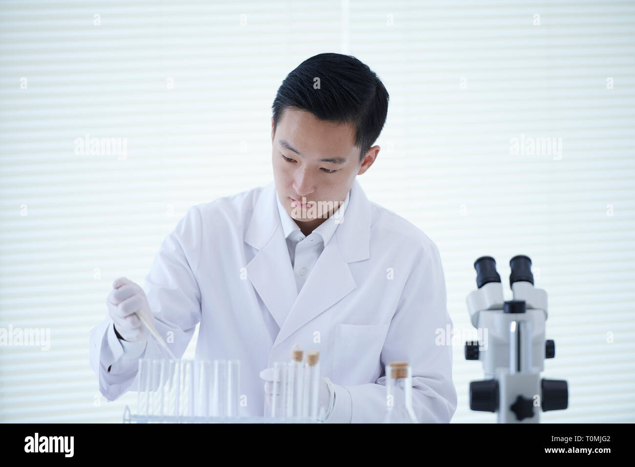 Young Japanese researcher in the lab Stock Photo - Alamy