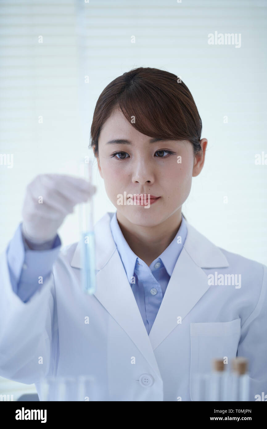 Young Japanese researcher in the lab Stock Photo - Alamy