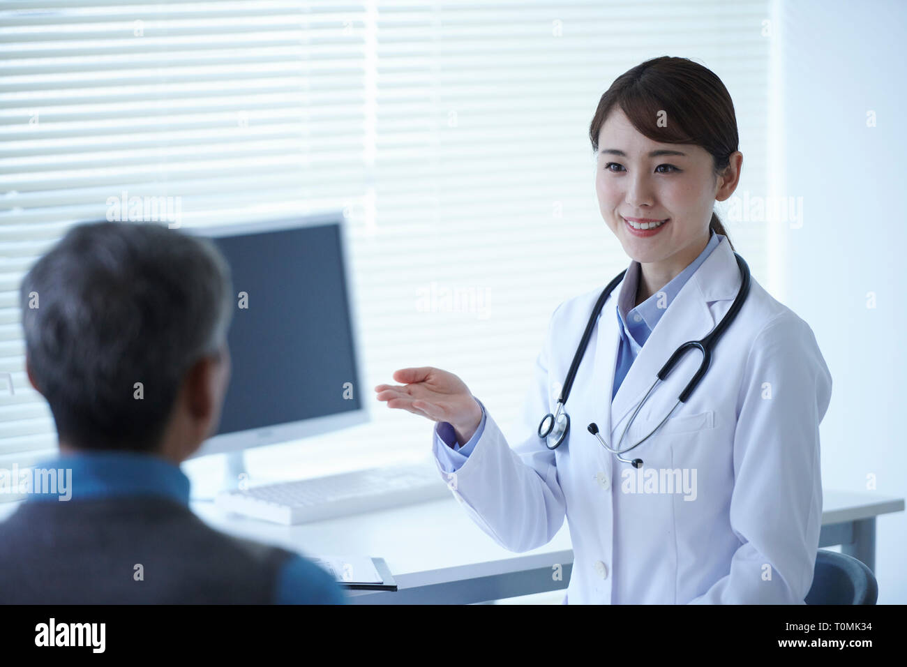 Japanese doctor at work Stock Photo - Alamy