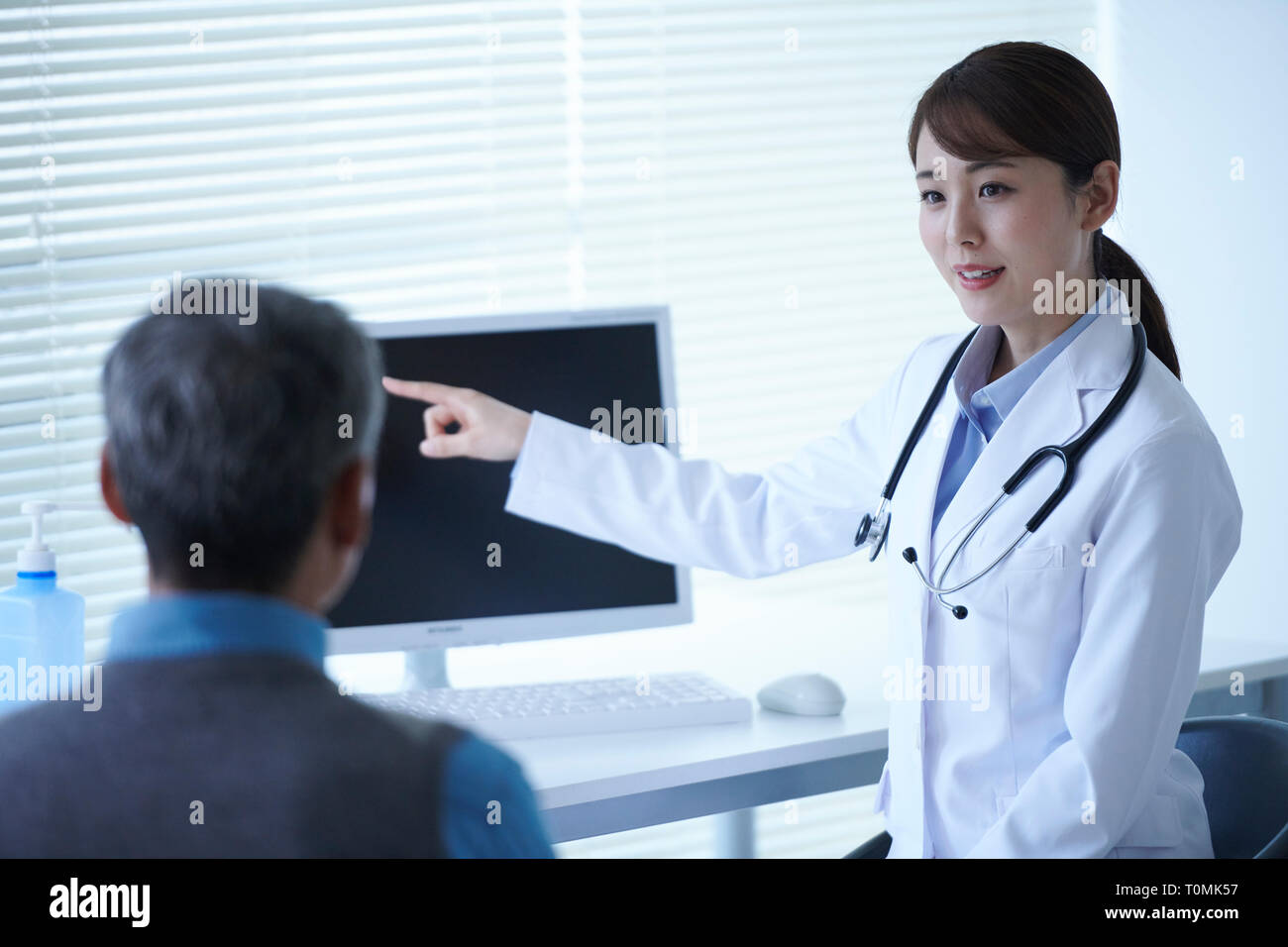 Japanese doctor at work Stock Photo - Alamy