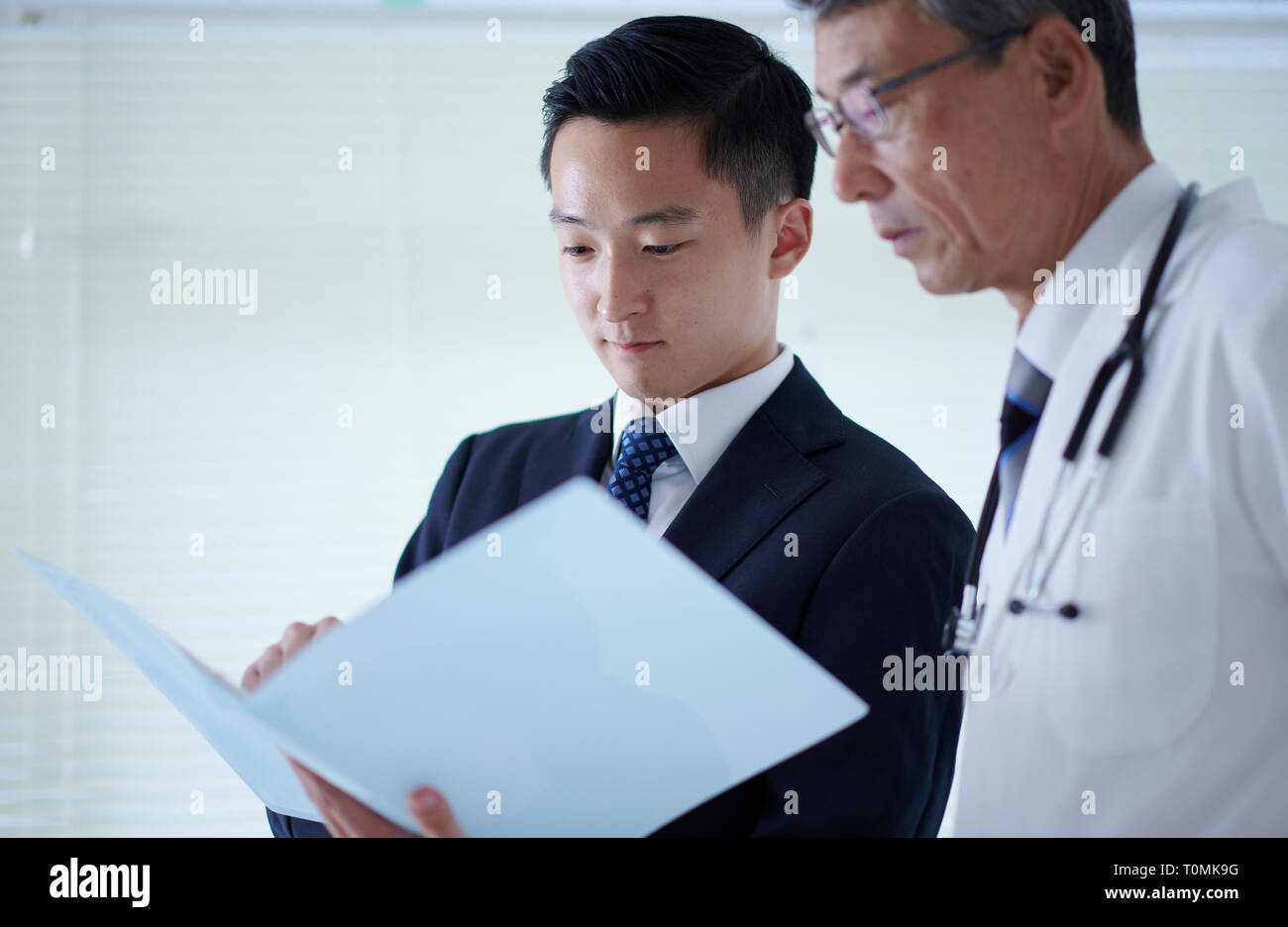 Japanese doctor at work Stock Photo - Alamy