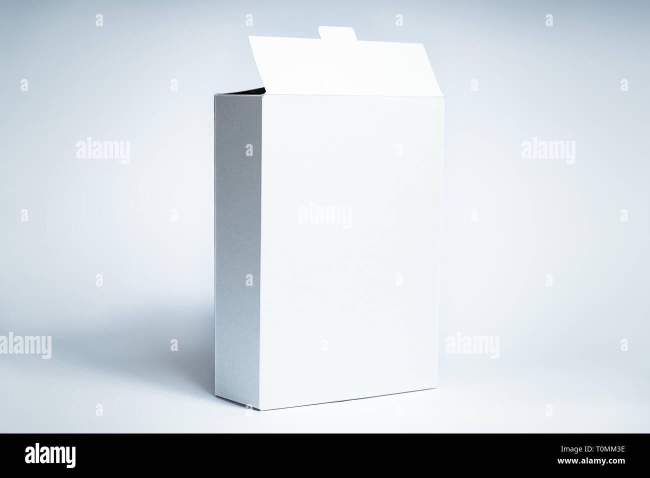 White generic box, studio shot. Blank carton food package, front view ...