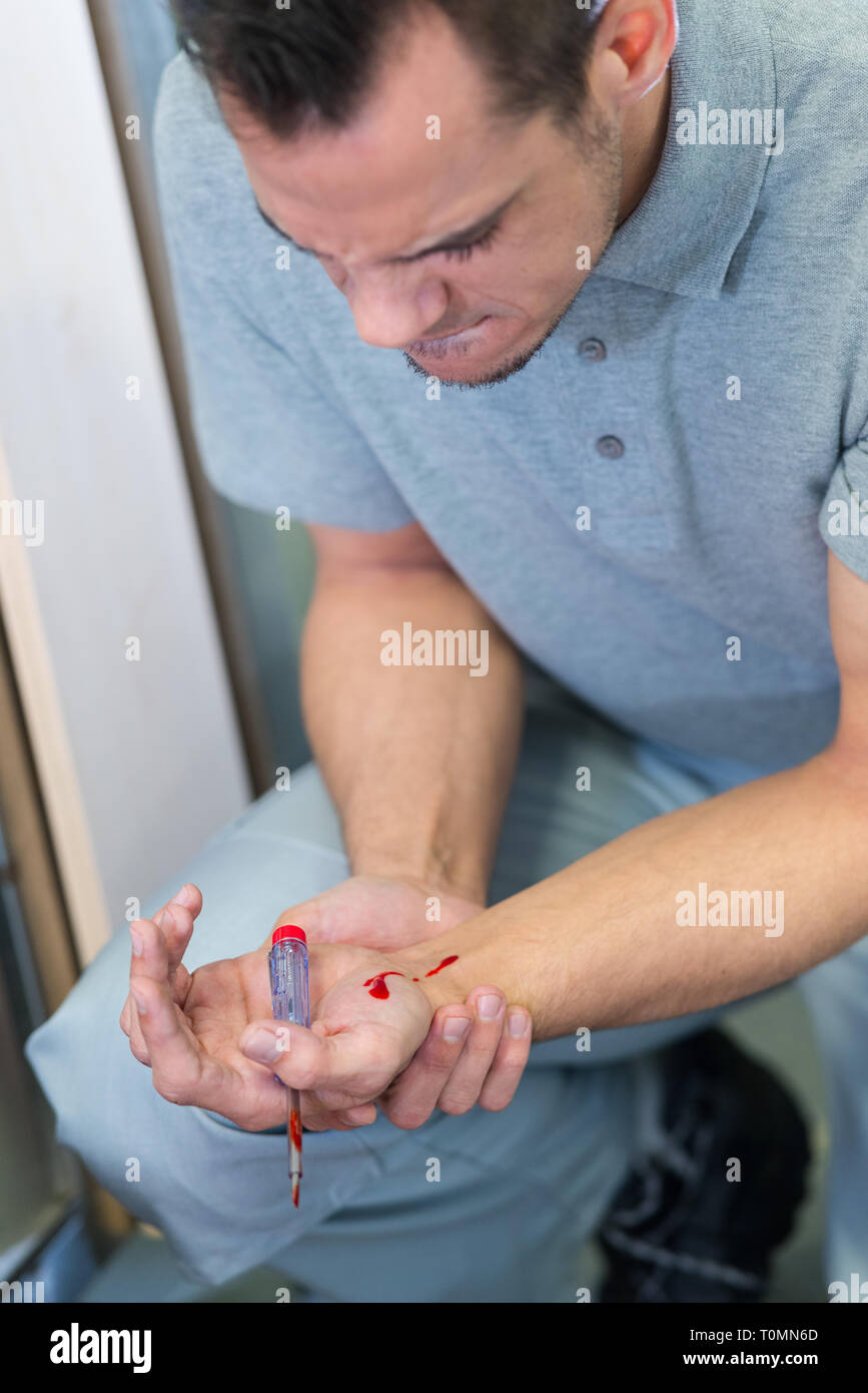 hand with blood and bandage Stock Photo - Alamy
