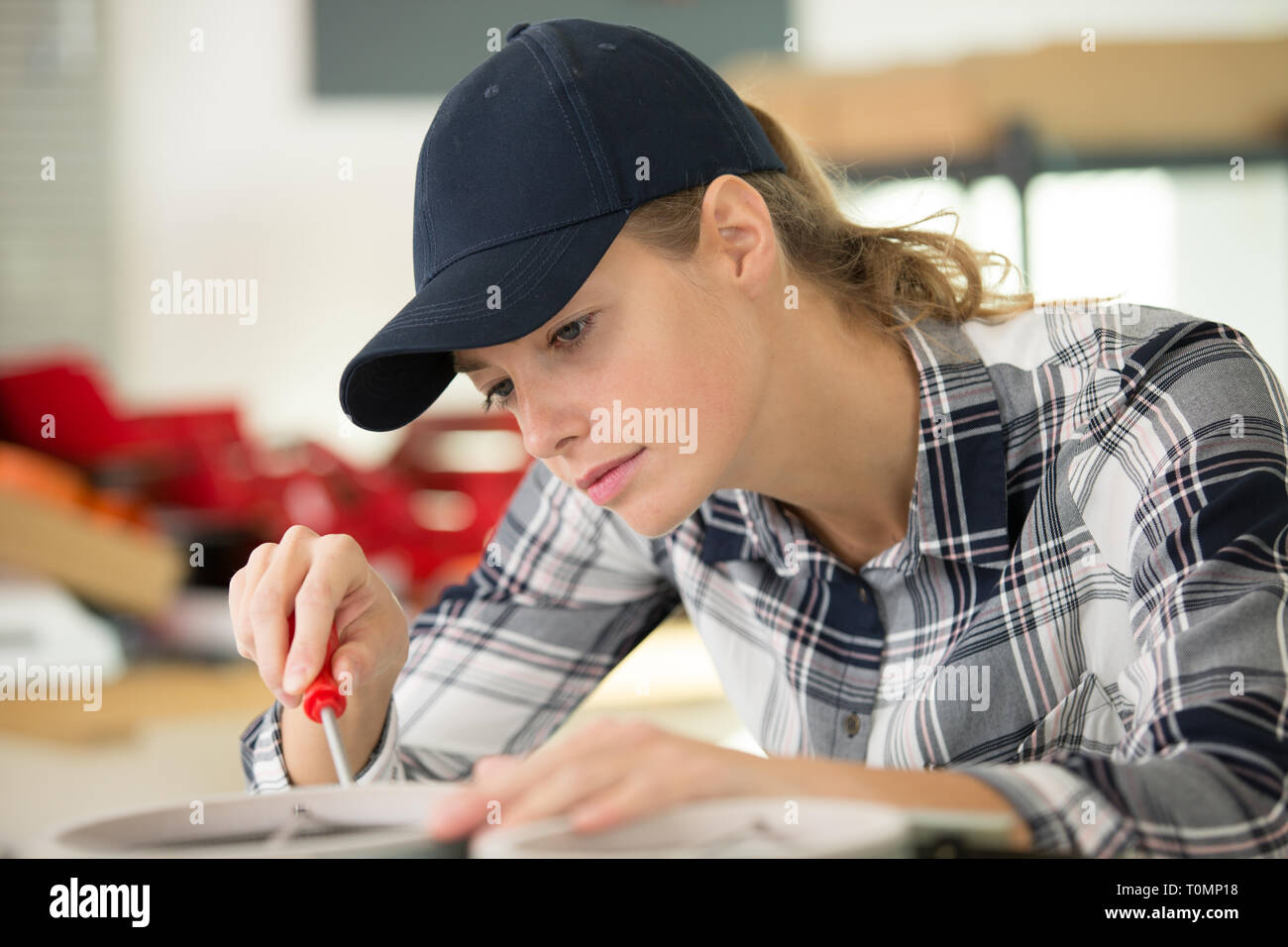 Young person doing diy hi-res stock photography and images - Alamy