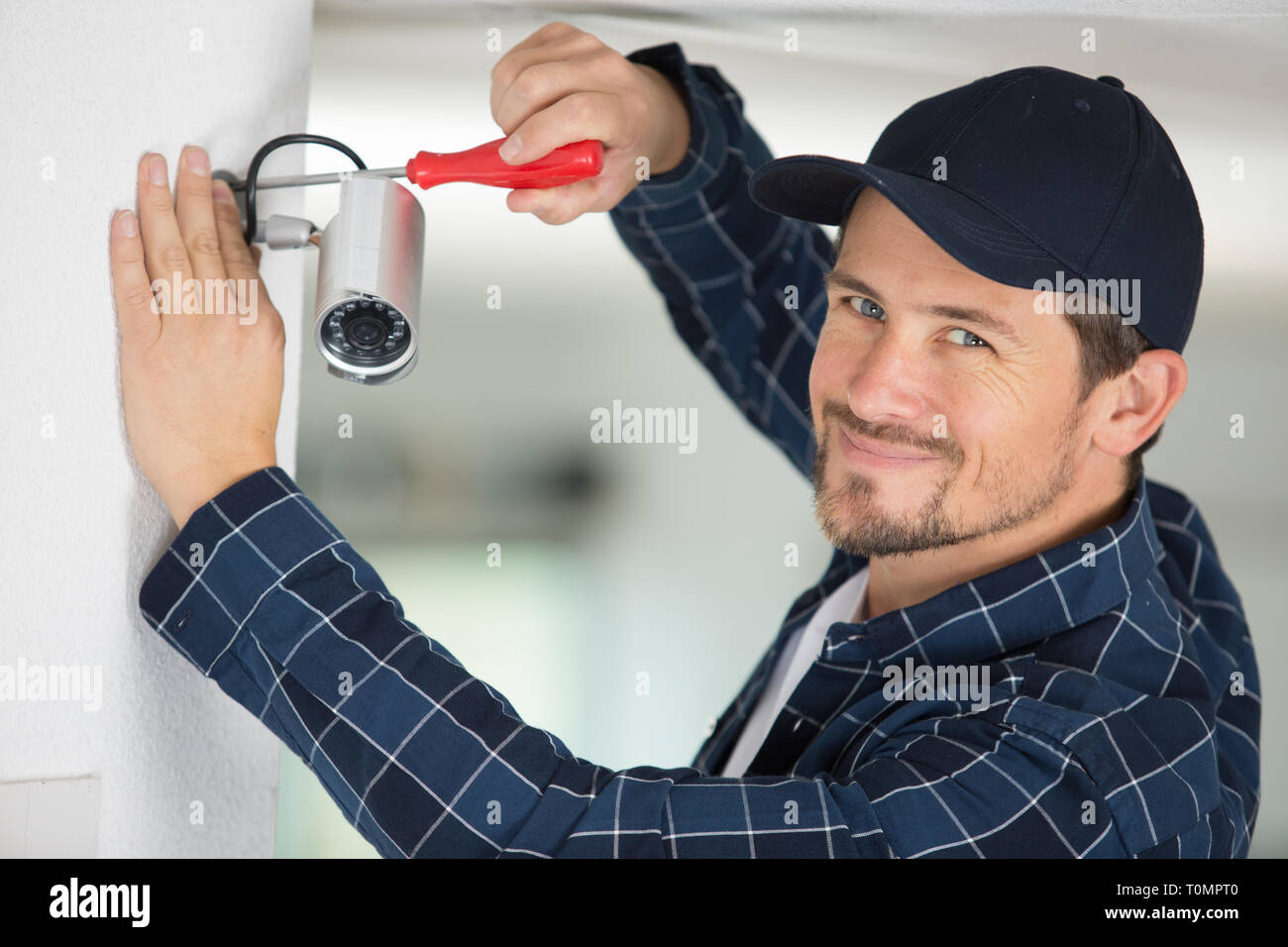 Technician installing cctv camera hi-res stock photography and images ...
