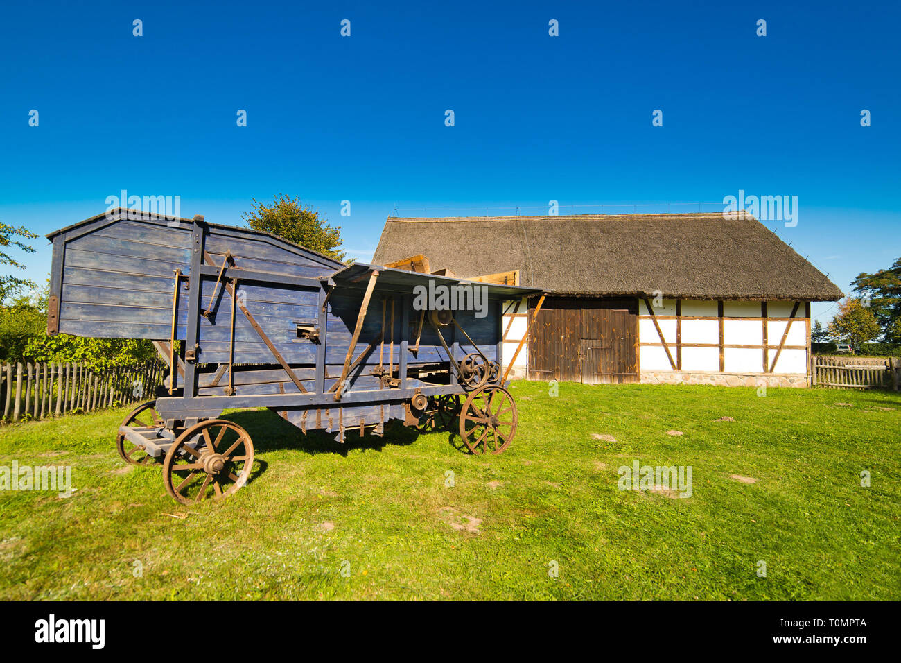 Old wooden thresher hi-res stock photography and images - Alamy