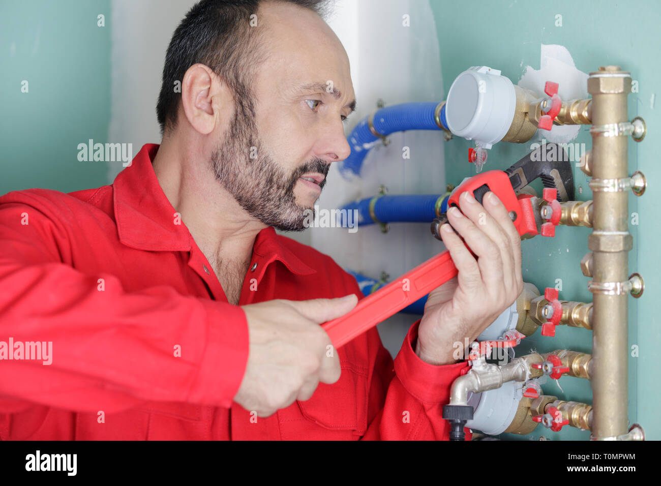 Water meters man hi-res stock photography and images - Alamy